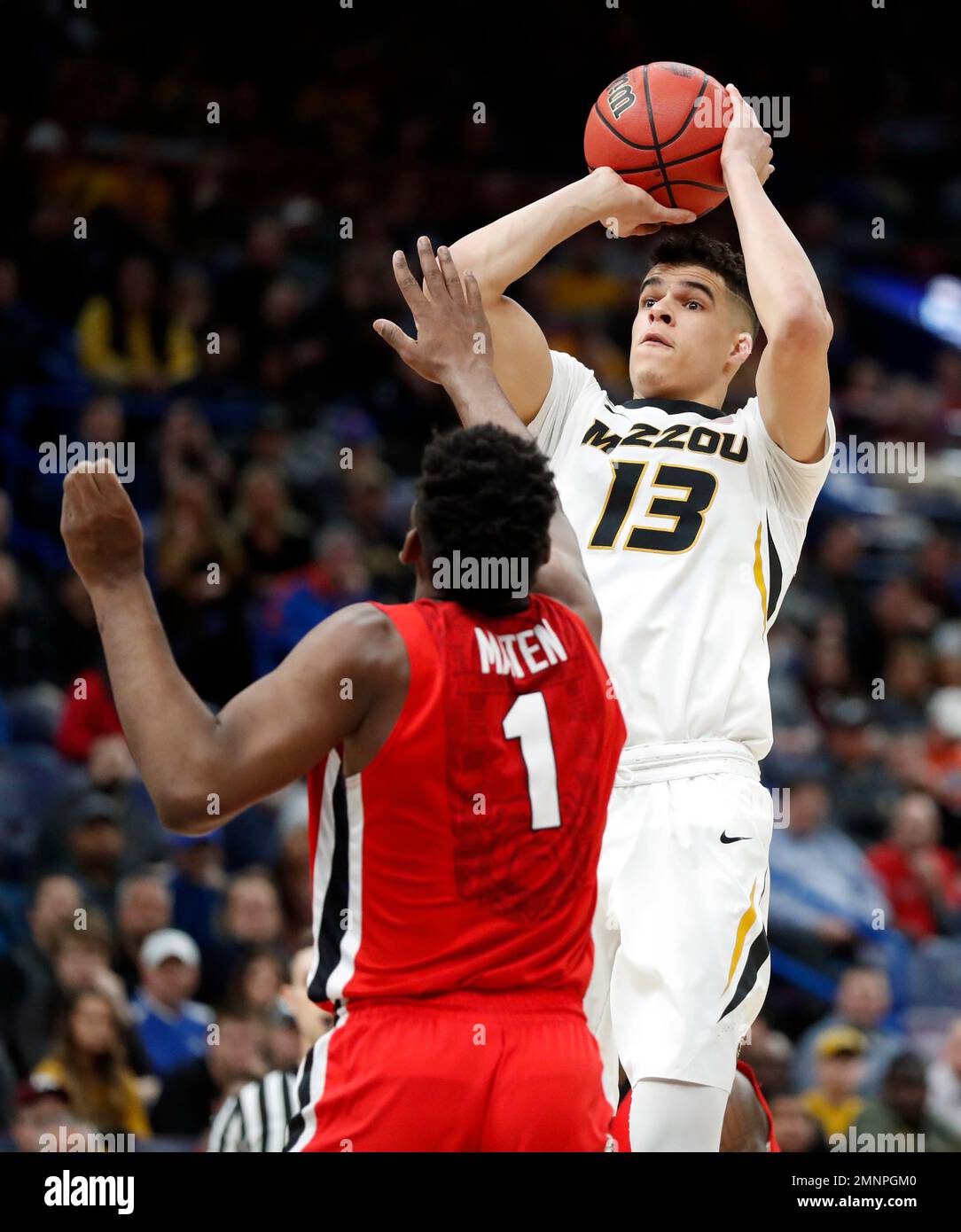 Missouri's Michael Porter Jr. (13) shoots over Georgia's Yante Maten ...