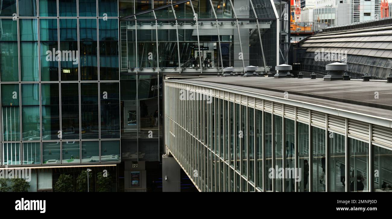 The modern pedestrian bridge connecting the Hikarie tower and the ...