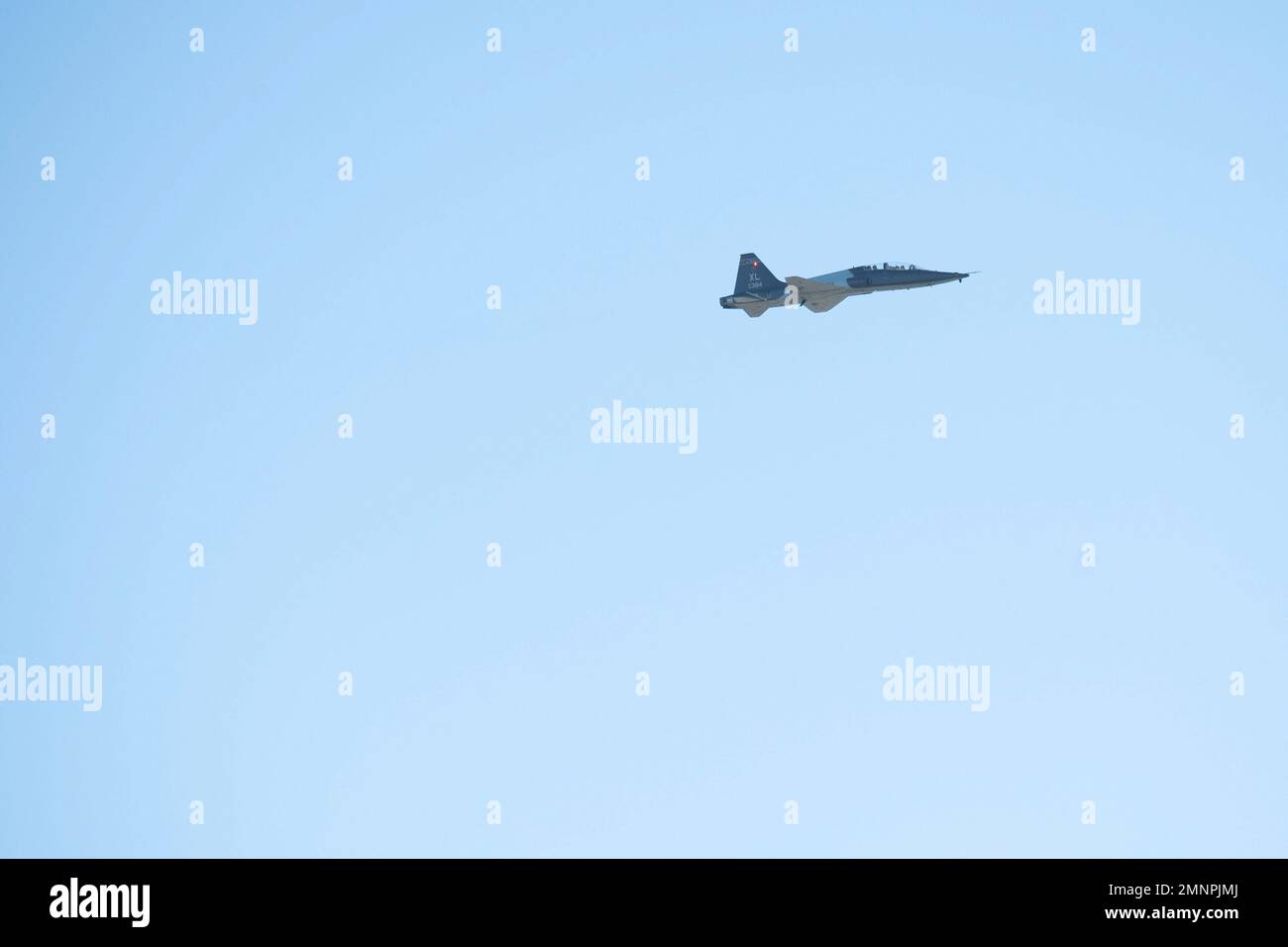 A T-38C Talon flies over the flight line at Laughlin Air Force Base ...