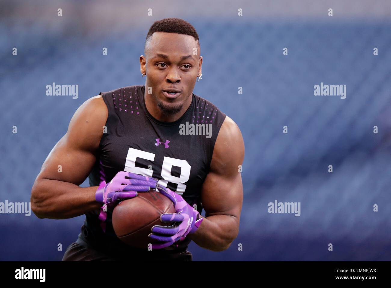 Nebraska defensive back Joshua Kalu runs a drill at the NFL football ...