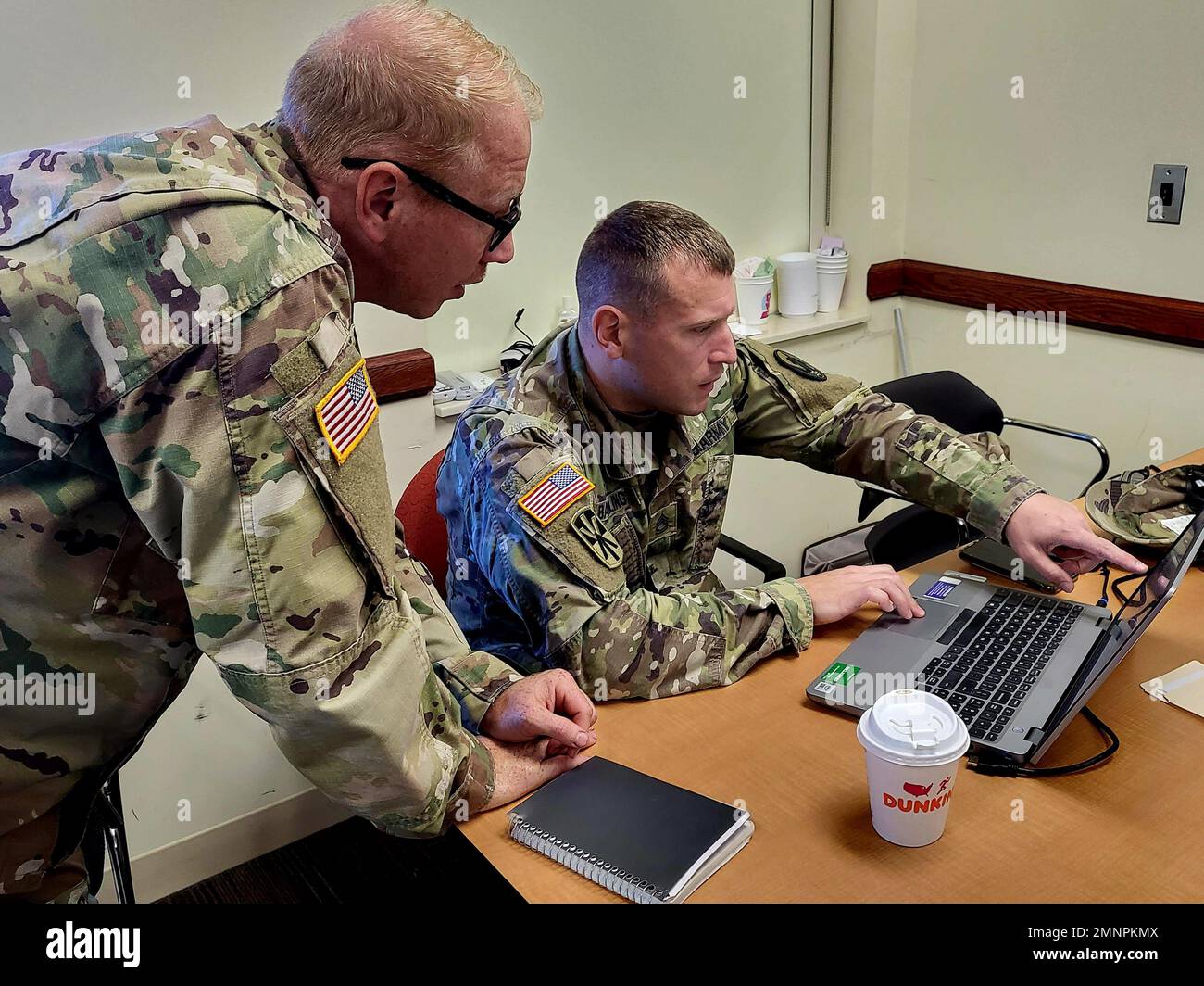 U.S. Army Reserve Sgt. 1st Class Brandon L. Bahling (right), an ...