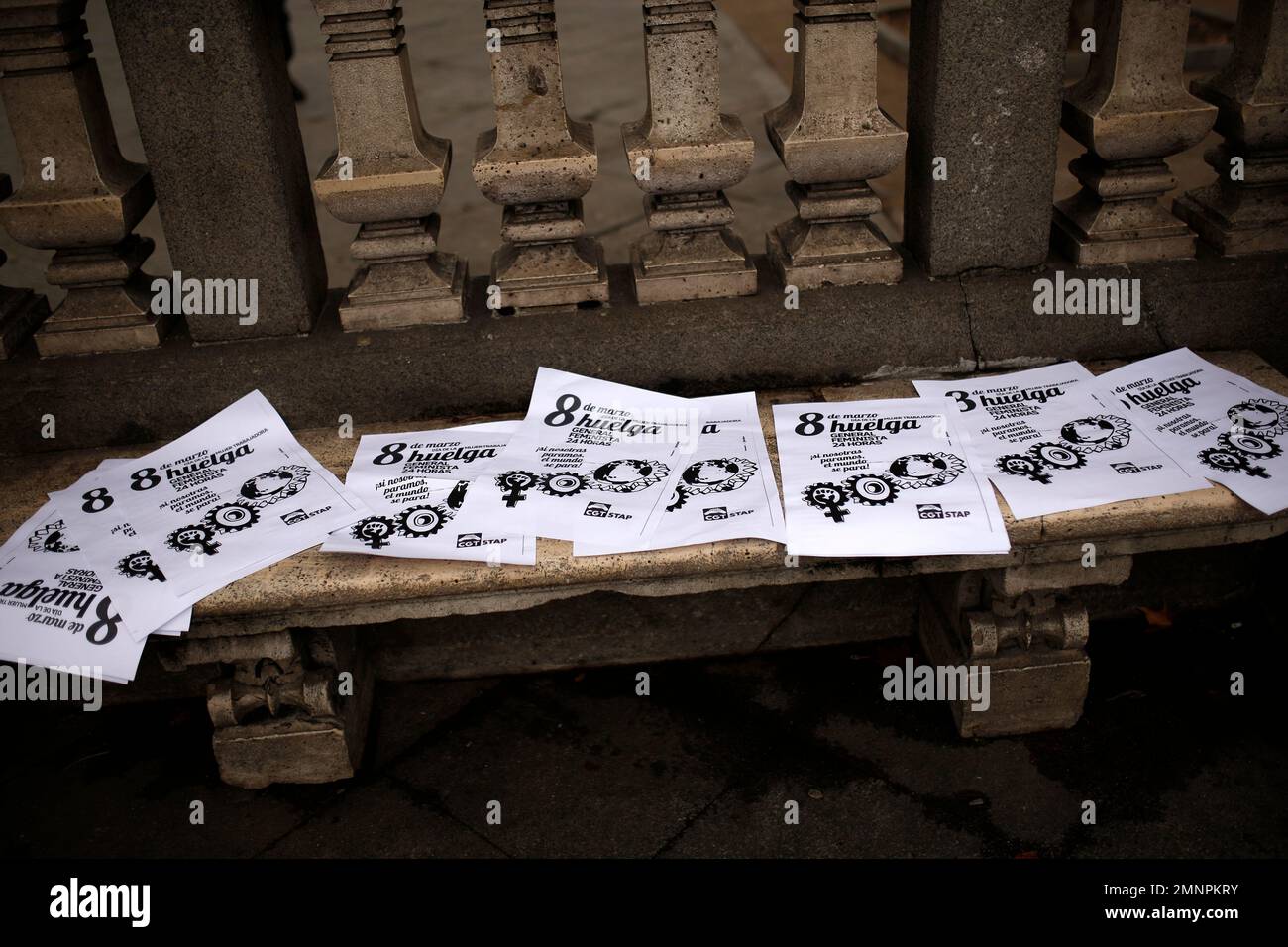 Posters reading in Spanish: "March 8. 24-hours feminist general strike ...