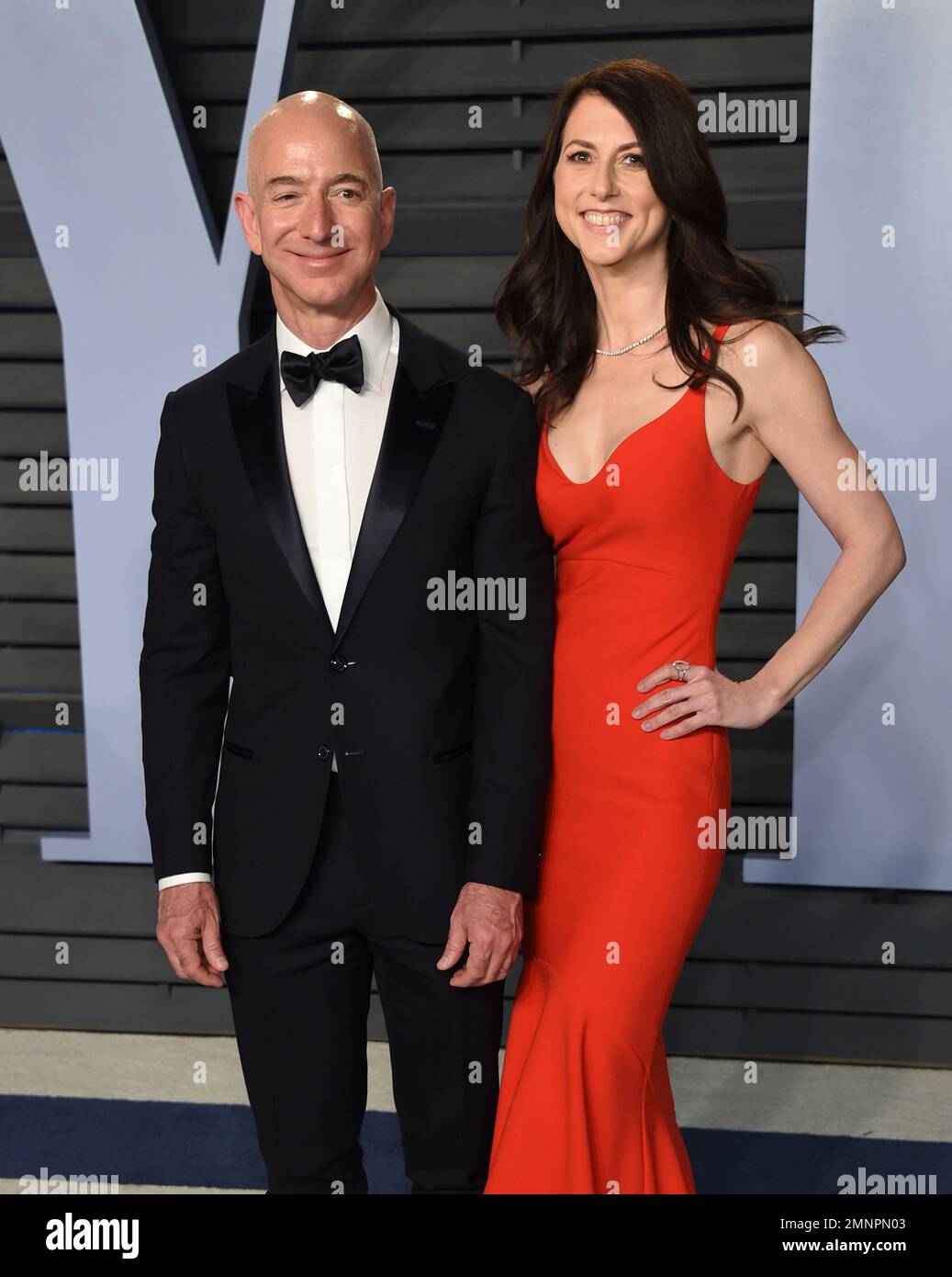 Jeff Bezos, left, and wife MacKenzie Bezos arrive at the Vanity Fair ...