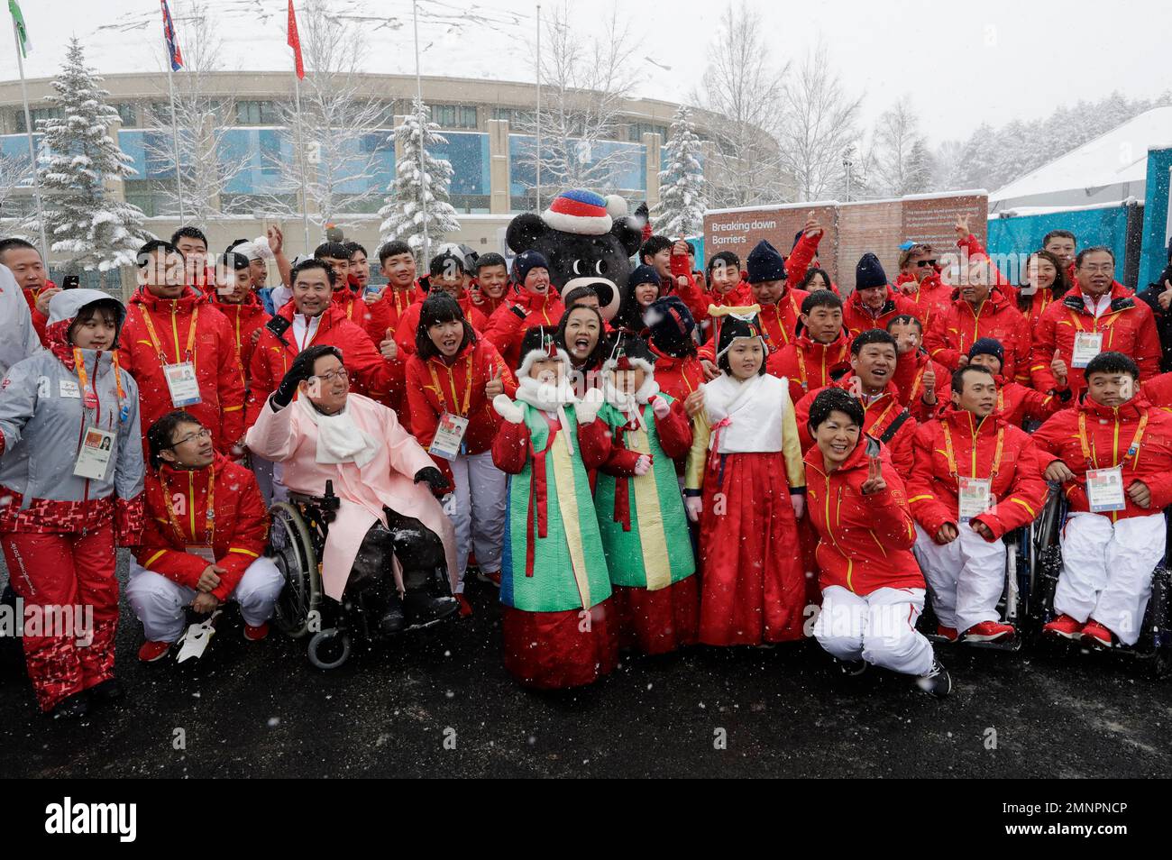 Chinese Paralympics team members take souvenir photos with mascot ...