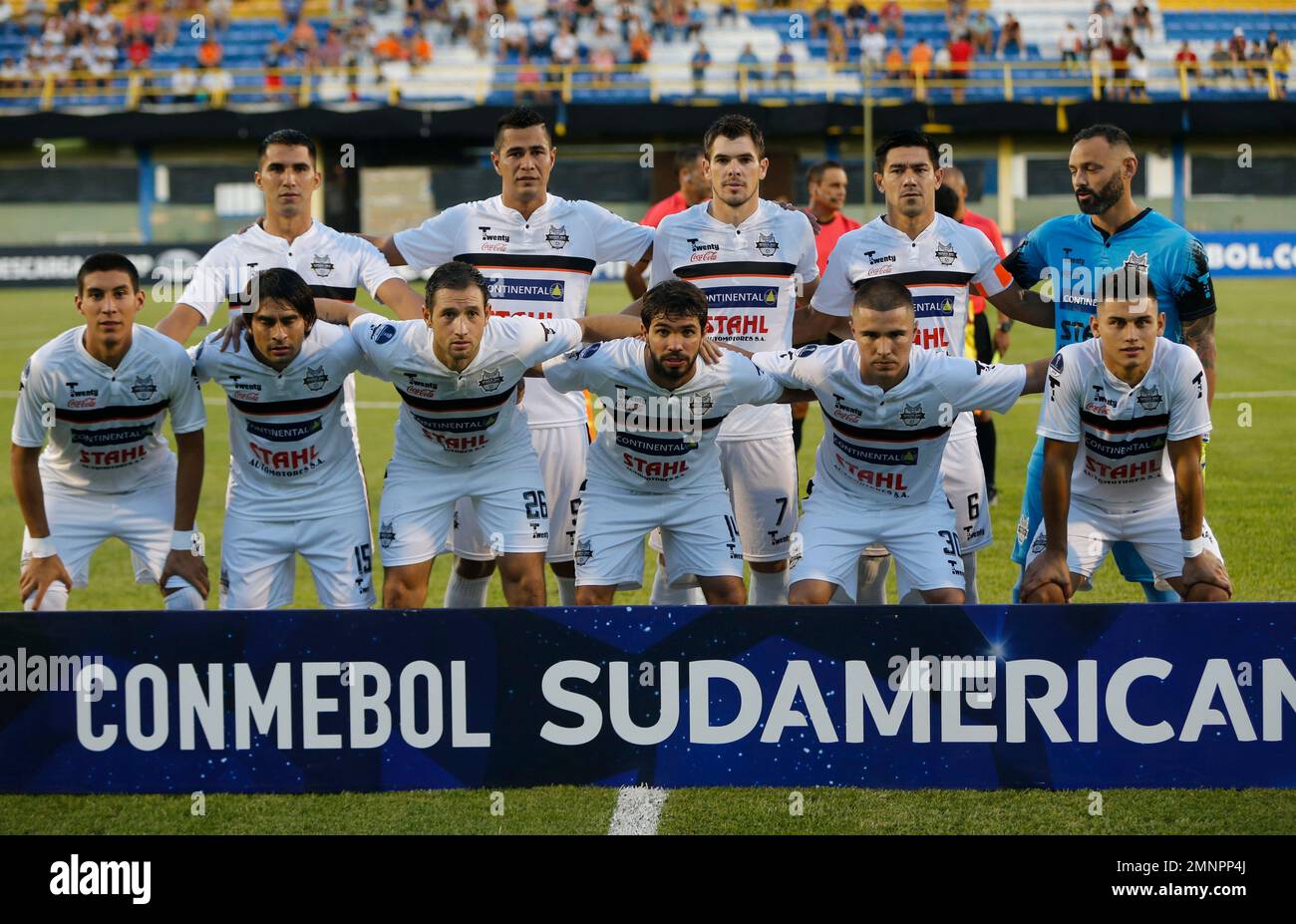 Players of Paraguay's General Diaz pose for a team picture before a ...