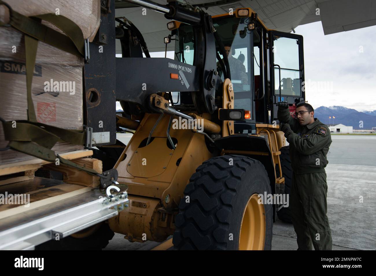 Alaska Air National Guard Staff Sgt. Marcus Moloney, assigned to 211th ...
