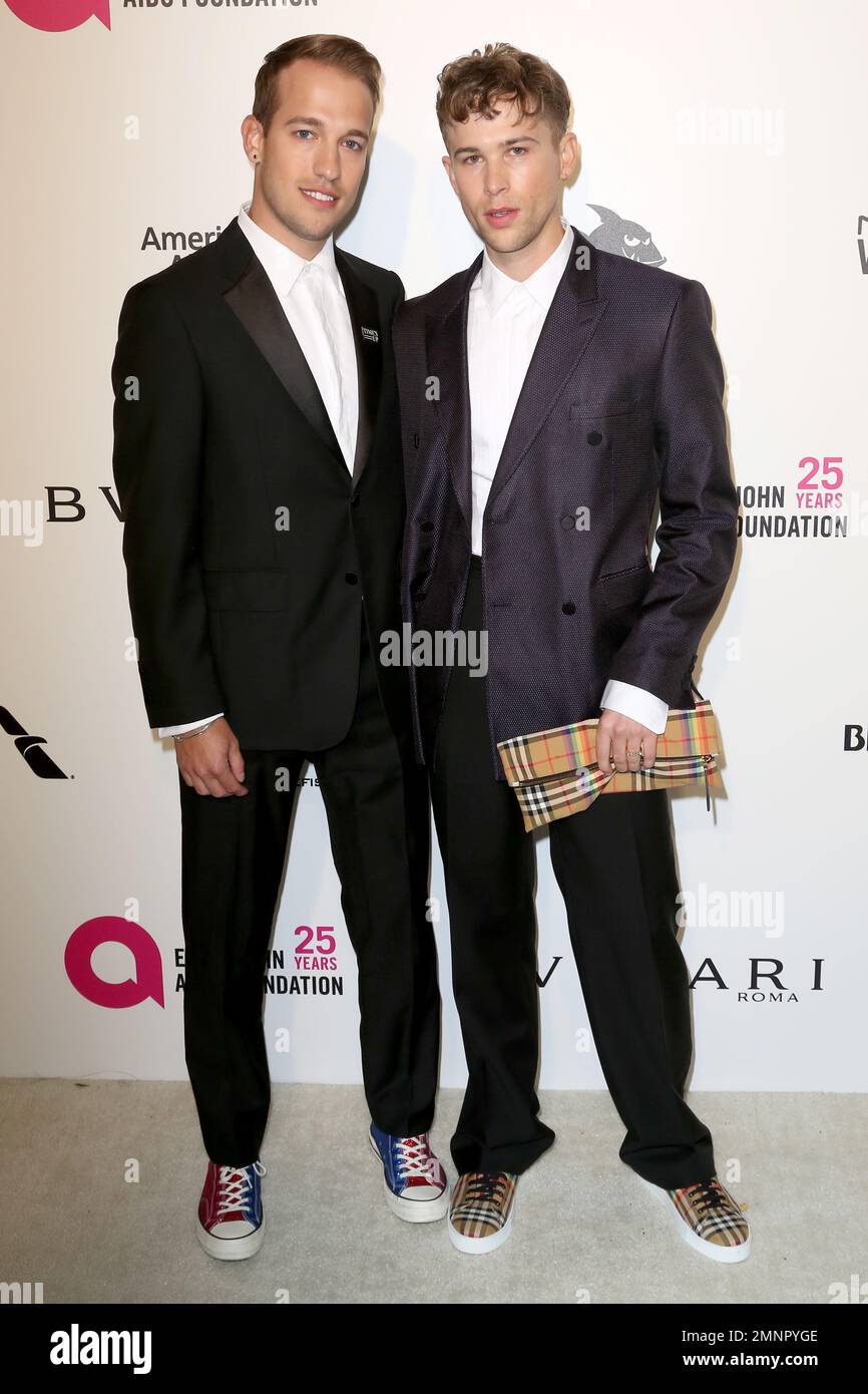 Peter Zurkuhlen, left, and Tommy Dorfman arrive at the 2018 Elton John ...