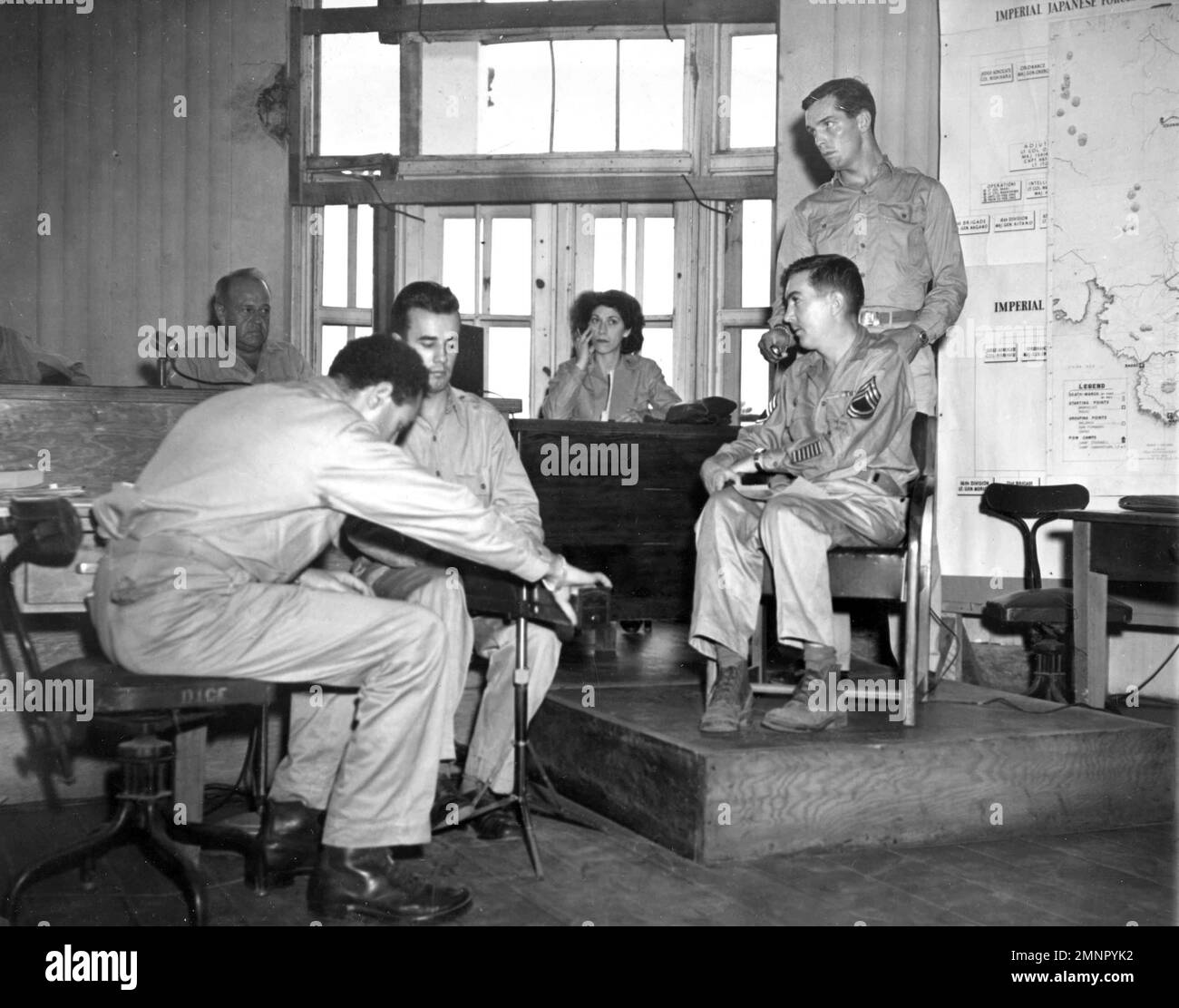 Seated in the witness chair, T/Sgt. Horace M. Clark of Salisbury, Md ...