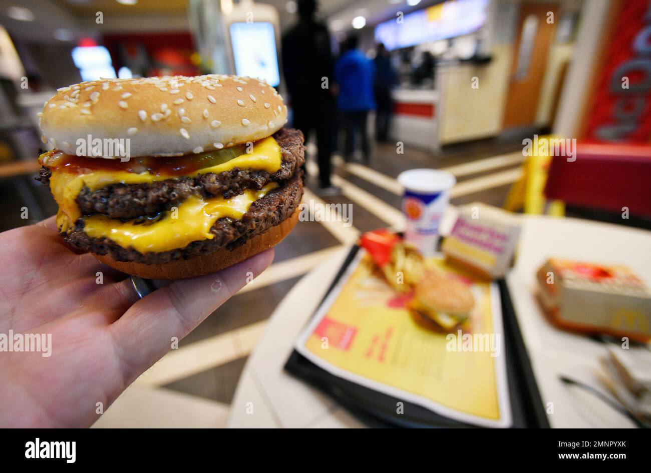 A McDonald's Double Quarter Pounder is shown with the new fresh beef Tuesday, March 6, 2018, in ...