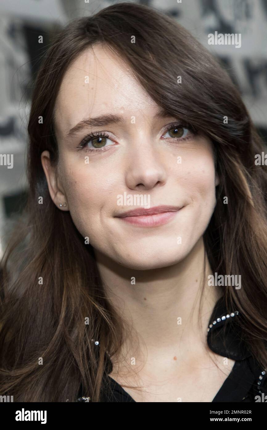 Stacy Martin poses for photographers prior to the Miu Miu ready-to-wear ...