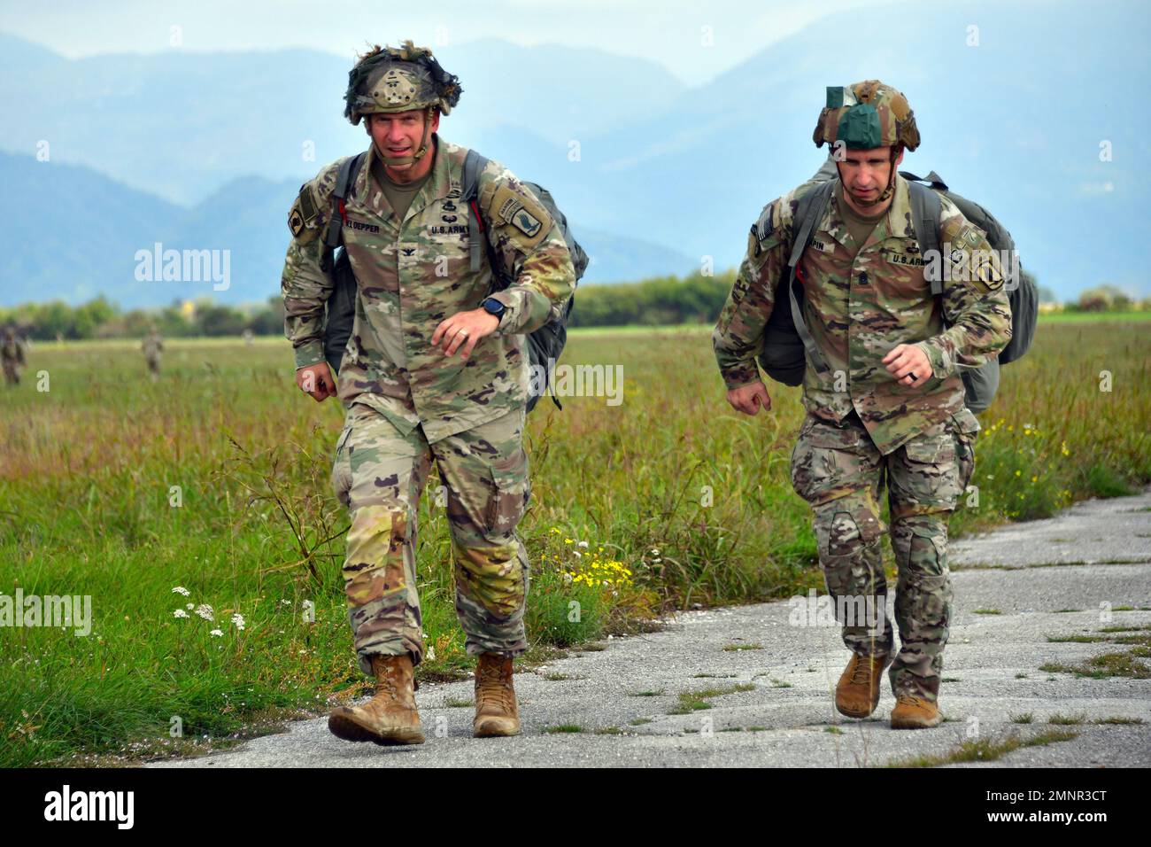 U.S. Army Col. Michael Kloepper, commander of the 173rd Airborne Brigade, and Command Sgt. Maj ...