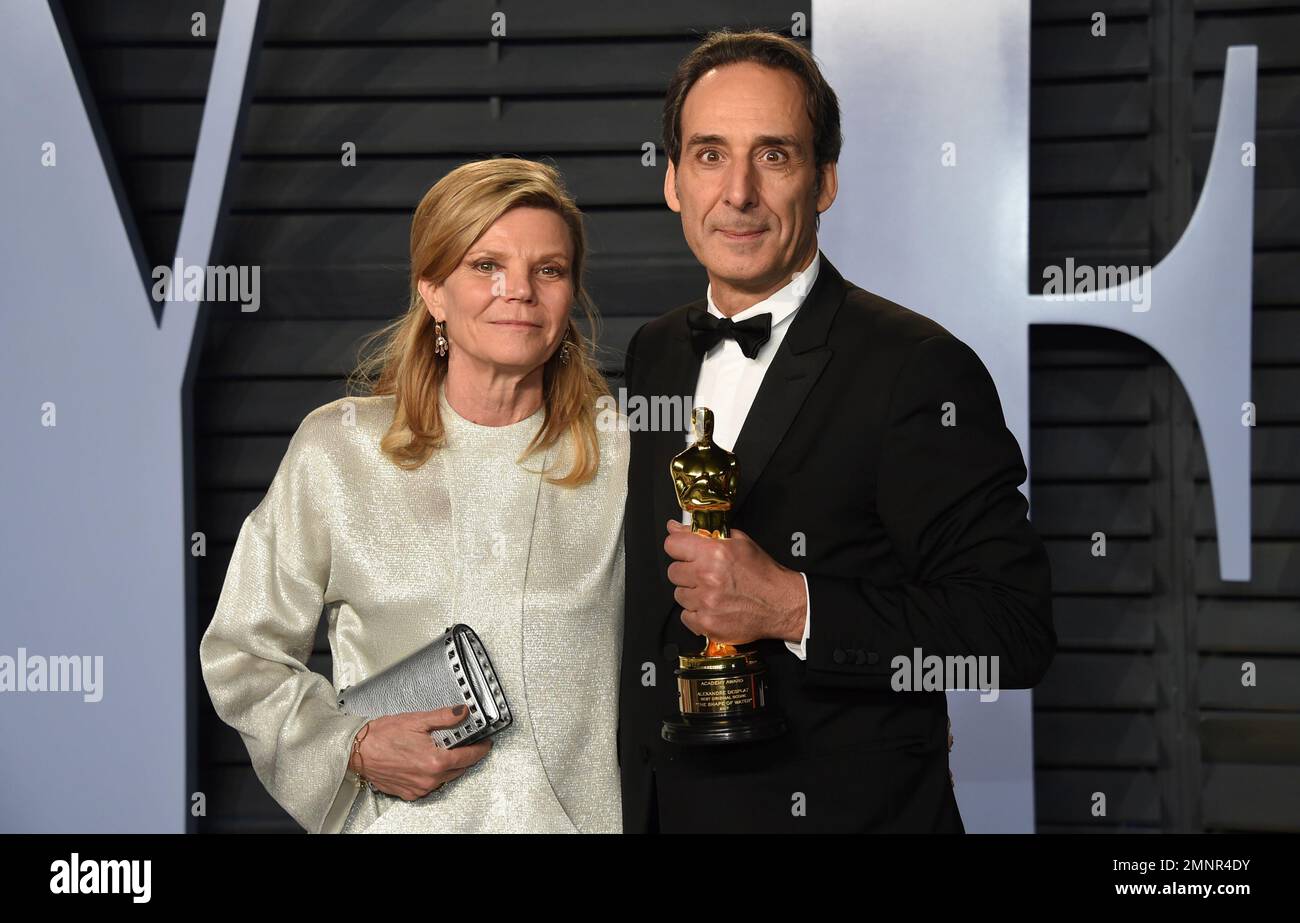 Dominique Lemonnier, left, and Alexandre Desplat, winner of the award ...