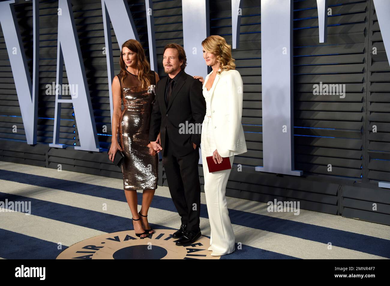 Jill McCormick, from left, Eddie Vedder, and Laura Dern arrive at the ...