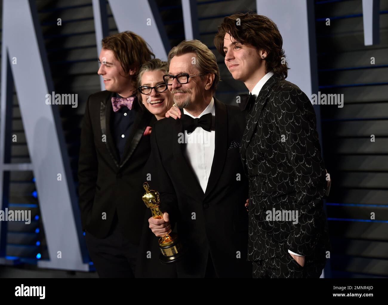 Gulliver Oldman, from left, Gisele Schmidt, Gary Oldman, winner of the ...