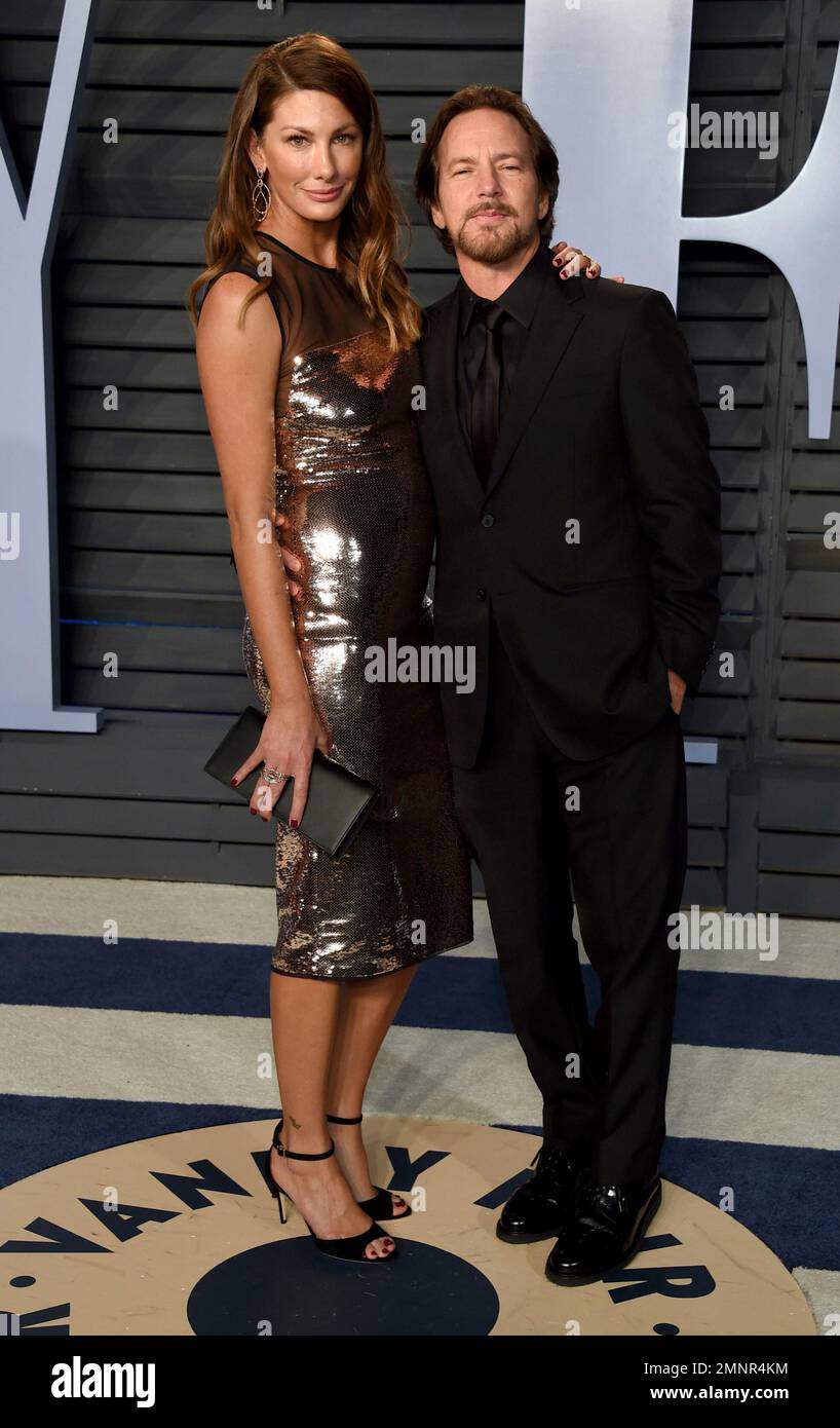 Jill McCormick, left, and Eddie Vedder arrive at the Vanity Fair Oscar ...