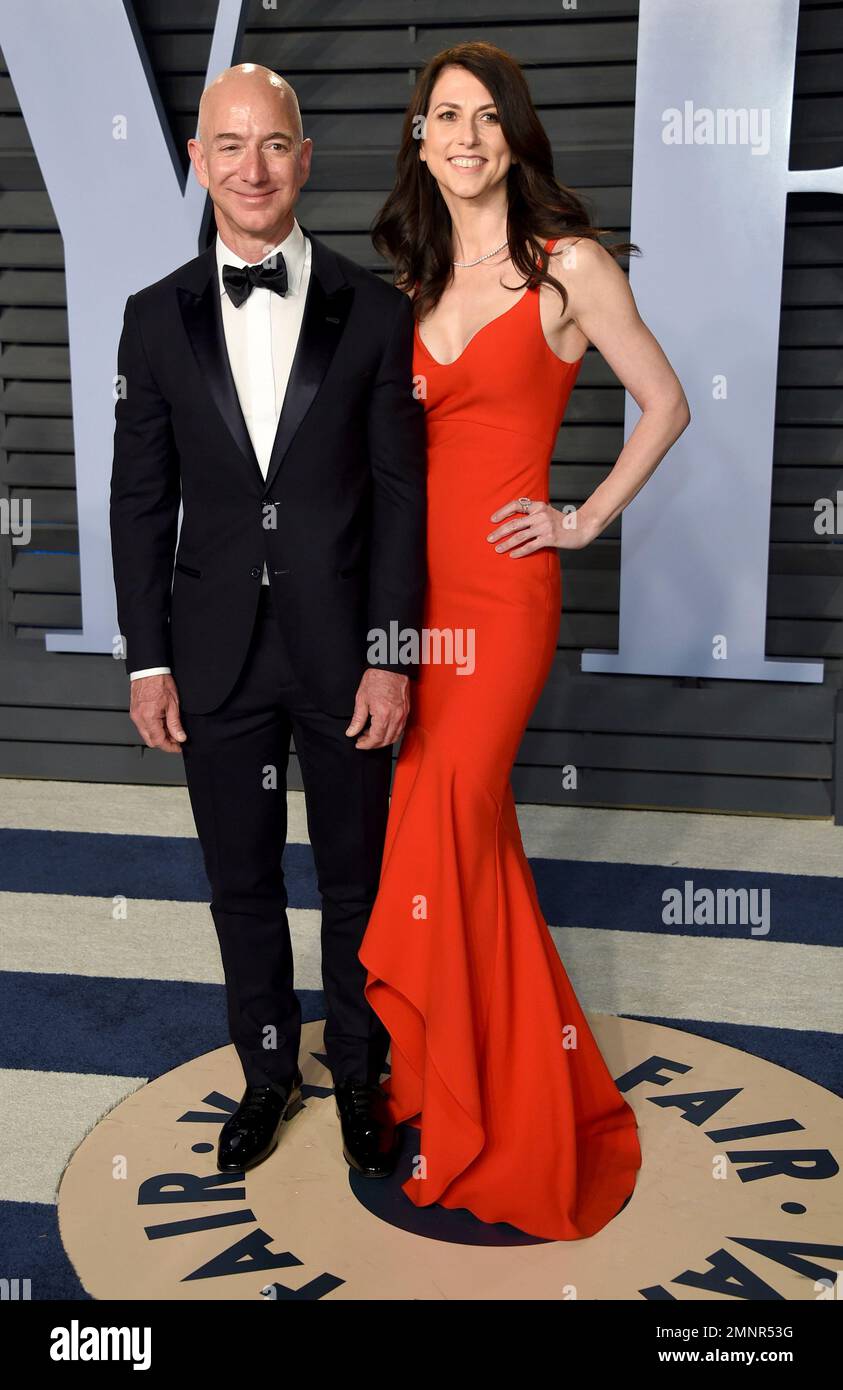Jeff Bezos, left, and MacKenzie Bezos arrives at the Vanity Fair Oscar ...
