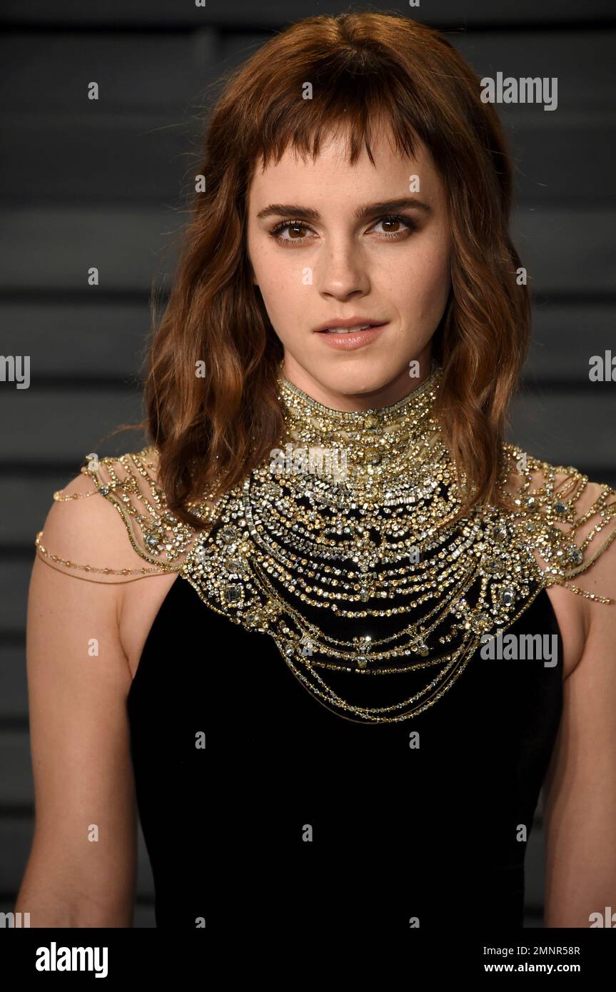 Emma Watson arrives at the Vanity Fair Oscar Party on Sunday, March 4 ...
