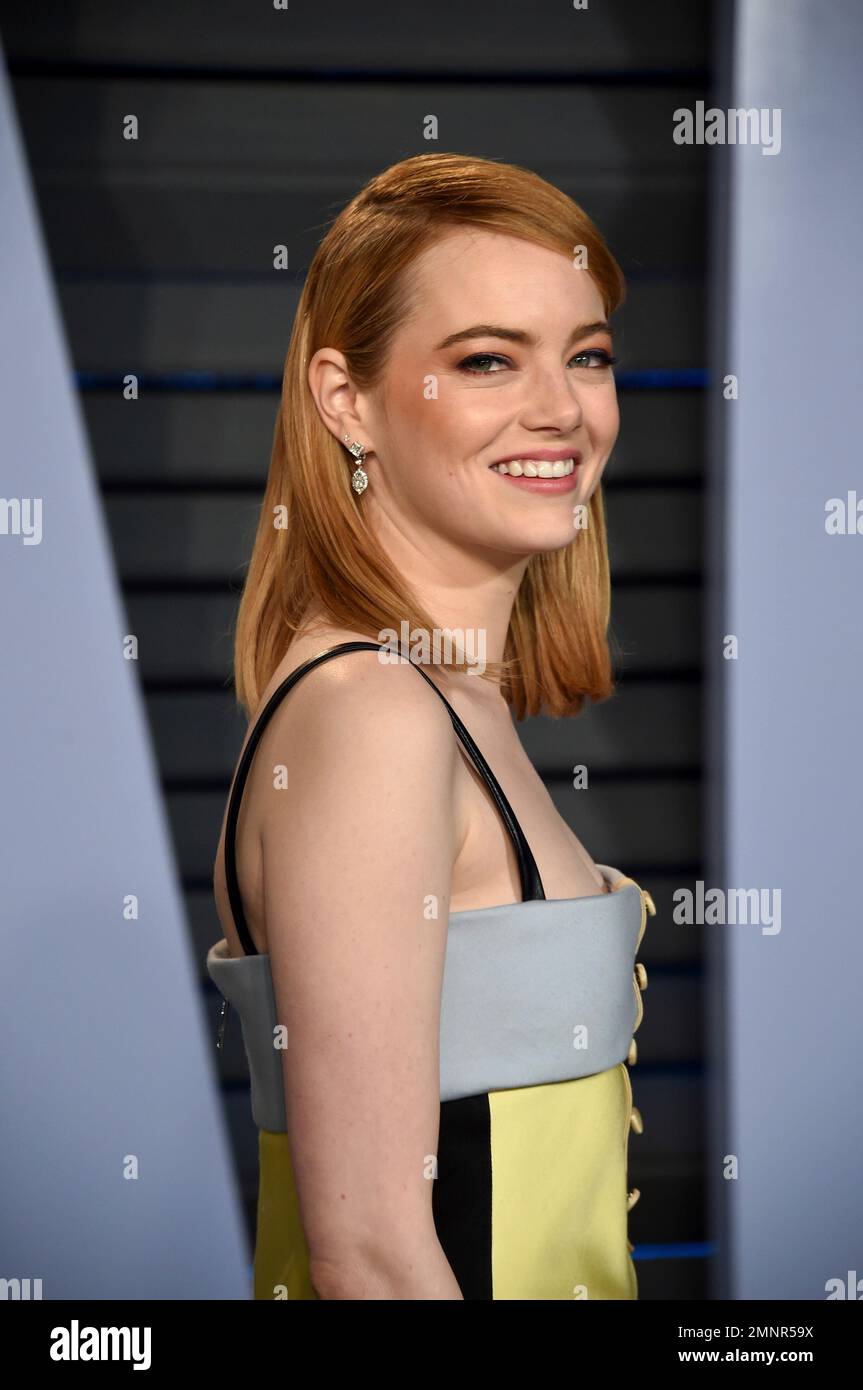 Emma Stone arrives at the Vanity Fair Oscar Party on Sunday, March 4 ...