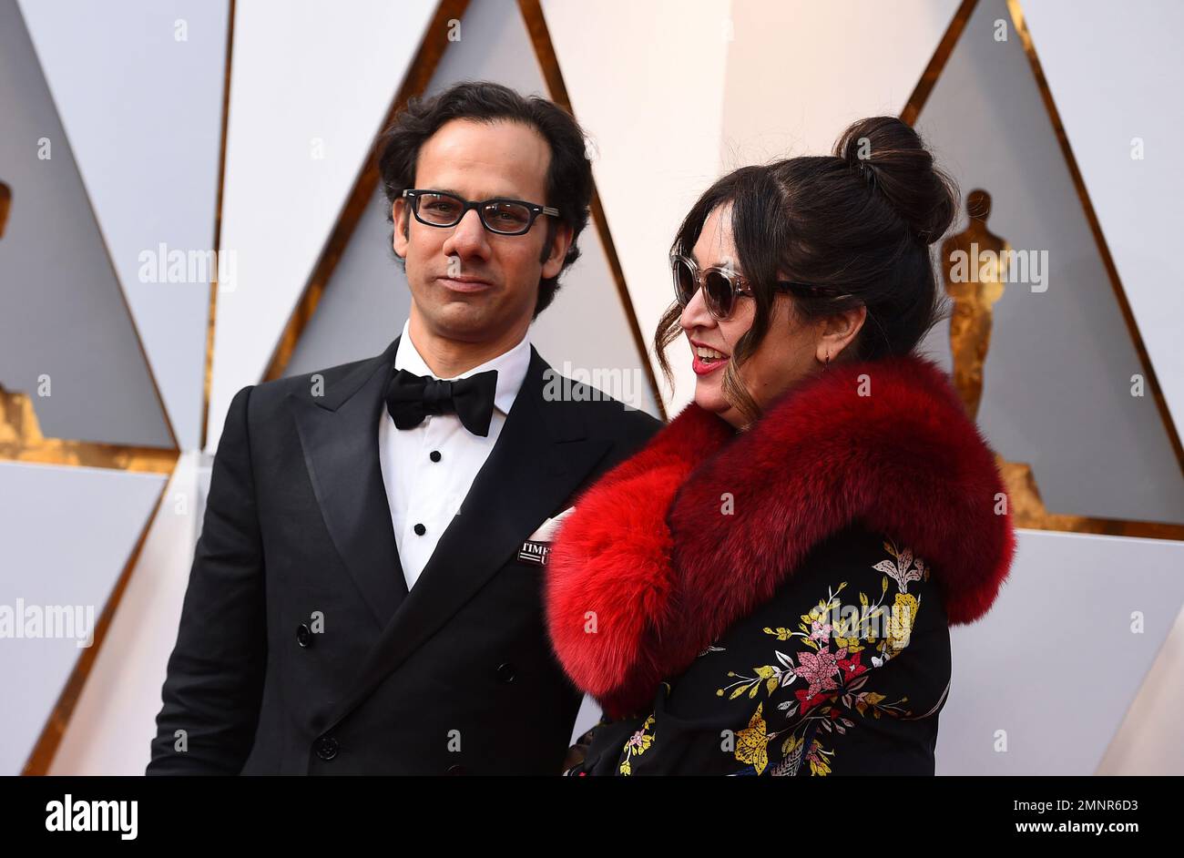 Dan Cogan, left, and Liz Garbus arrive at the Oscars on Sunday, March 4 ...