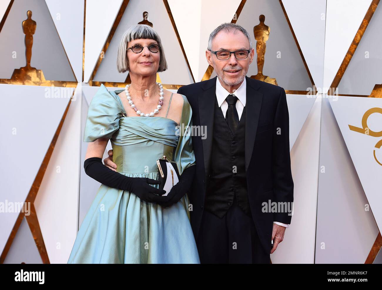 Lois Burwell, left, and John Toll arrive at the Oscars on Sunday, March ...