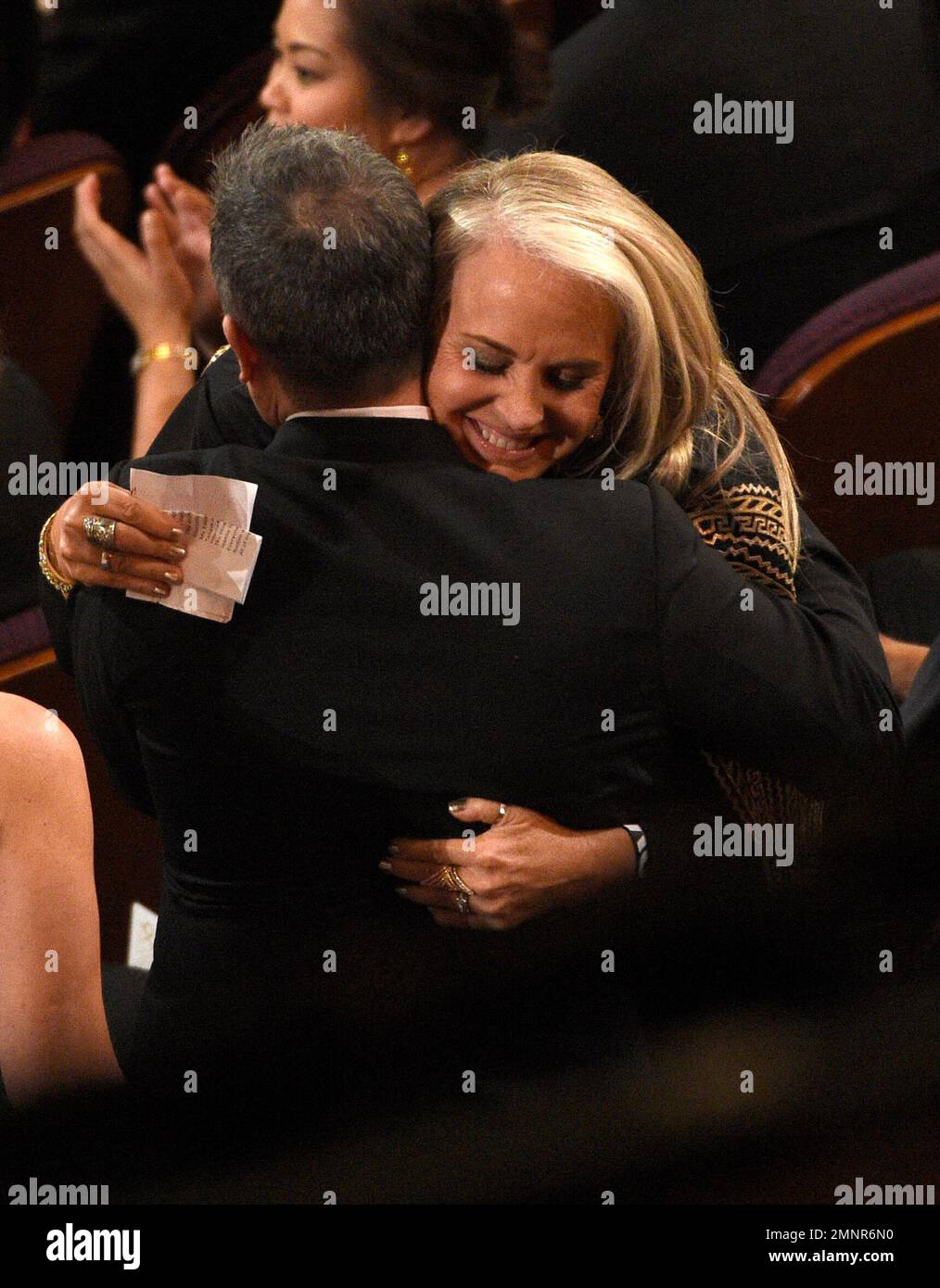 Lee Unkrich, left, and Darla K. Anderson embrace after winning the ...