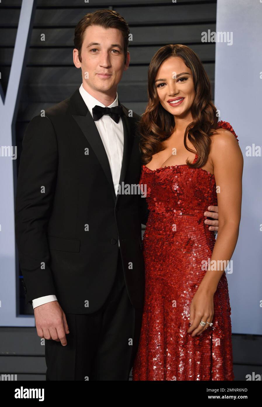 Miles Teller, left, and Keleigh Sperry arrive at the Vanity Fair Oscar ...