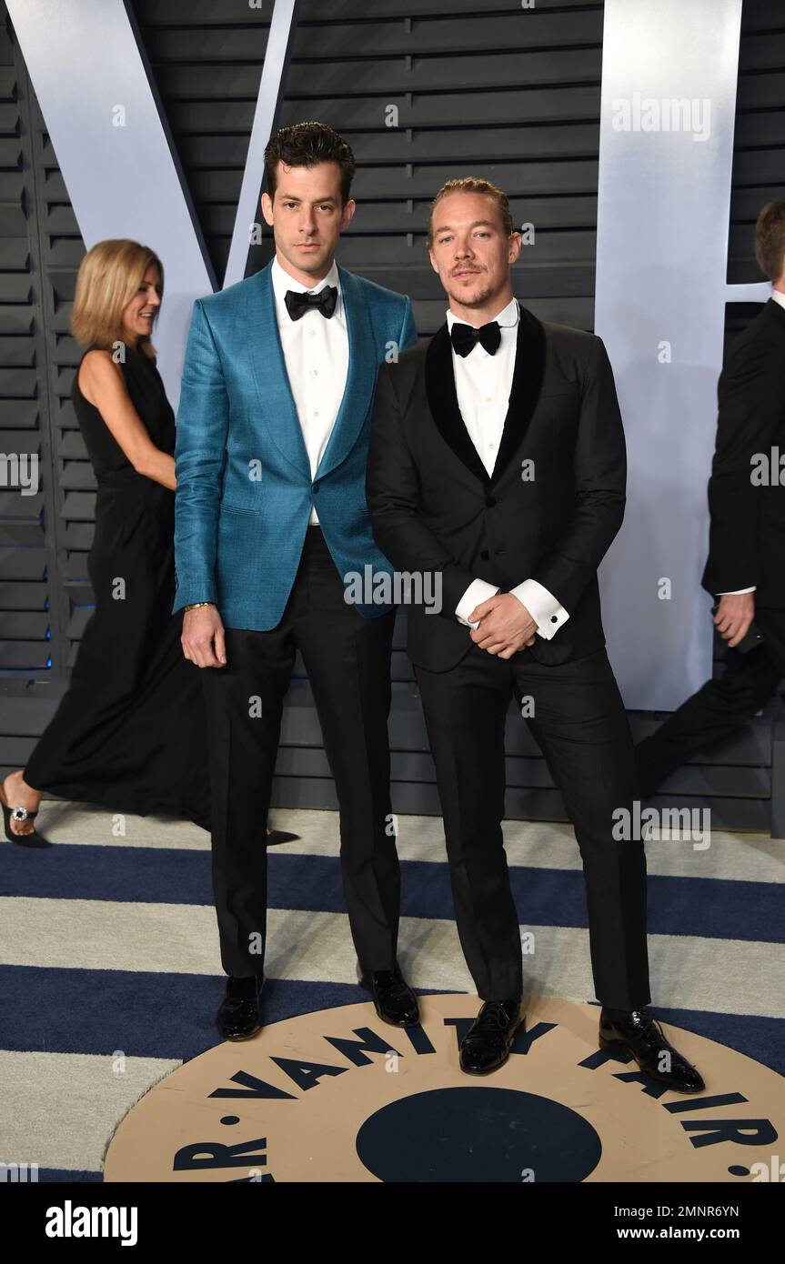 Mark Ronson, left, and Diplo arrive at the Vanity Fair Oscar Party on ...