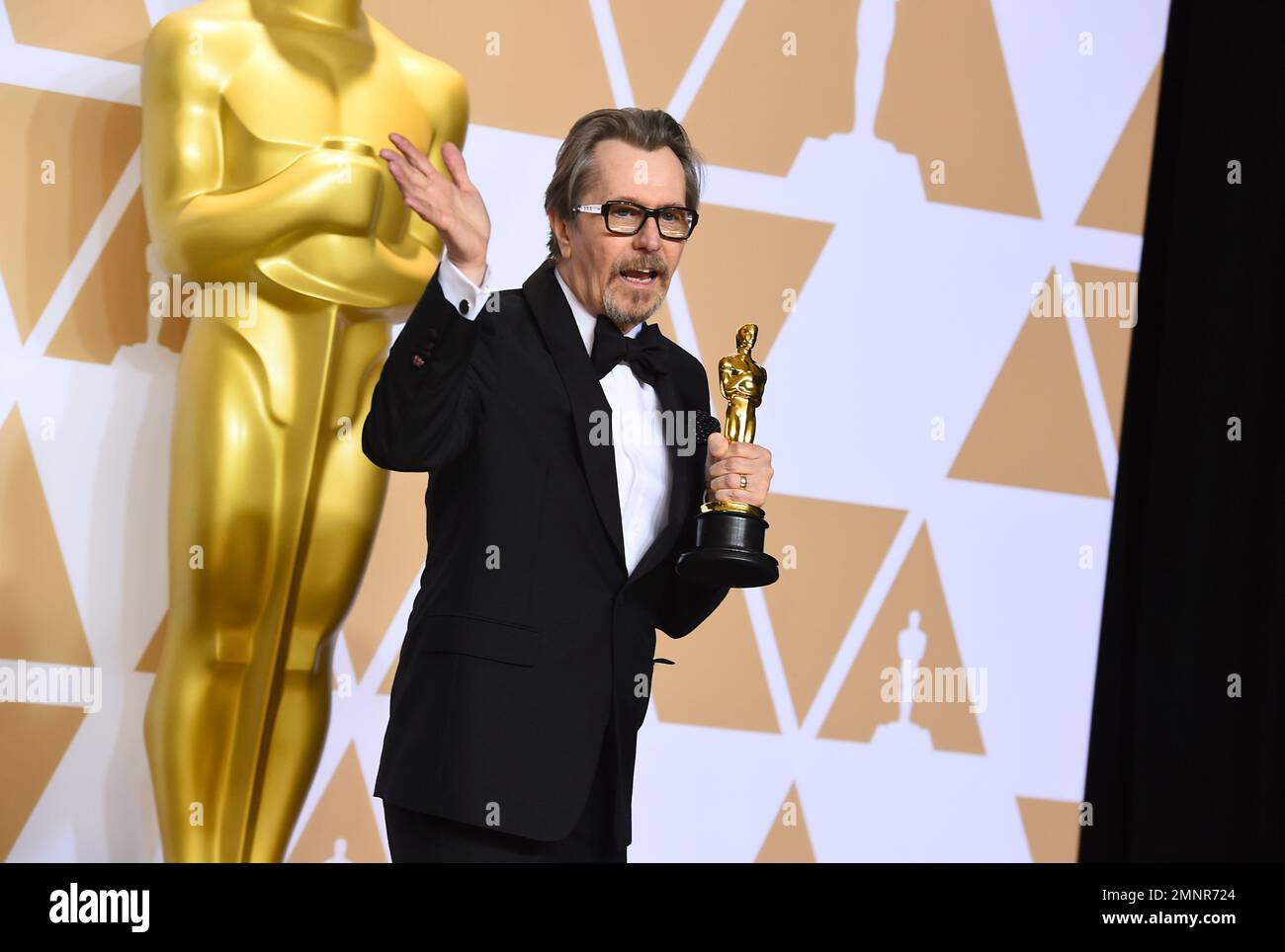 Gary Oldman, winner of the award for best performance by an actor in a leading role for "Darkest ...