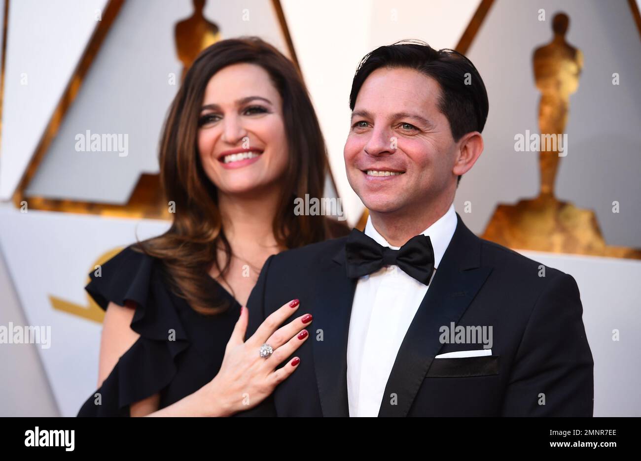 Lauren Rachelle Levy, left, and Scott Neustadter arrive at the Oscars ...