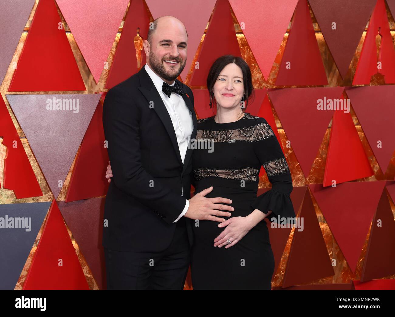 Jordan Horowitz, left, and Julia Hart arrive at the Oscars on Sunday ...