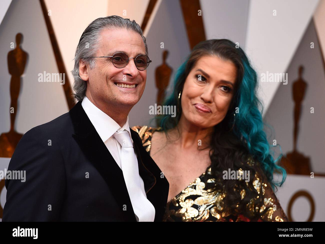 Mark Mangini, and Ann Mangini arrive at the Oscars on Sunday, March 4 ...