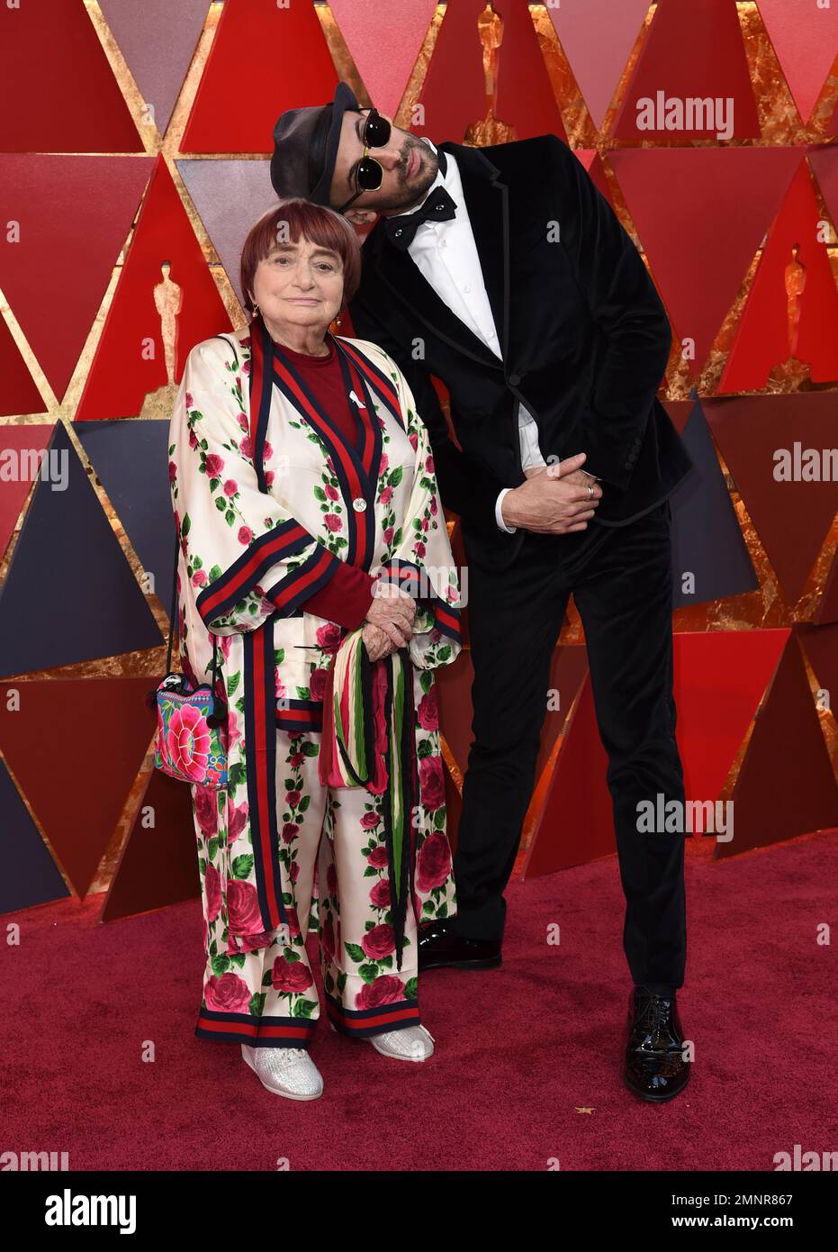 Agnes Varda, left, and JR arrive at the Oscars on Sunday, March 4, 2018 ...