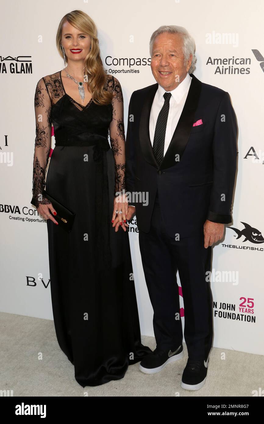 Ricki Lander, left, and Robert Kraft arrive at the 2018 Elton John AIDS ...