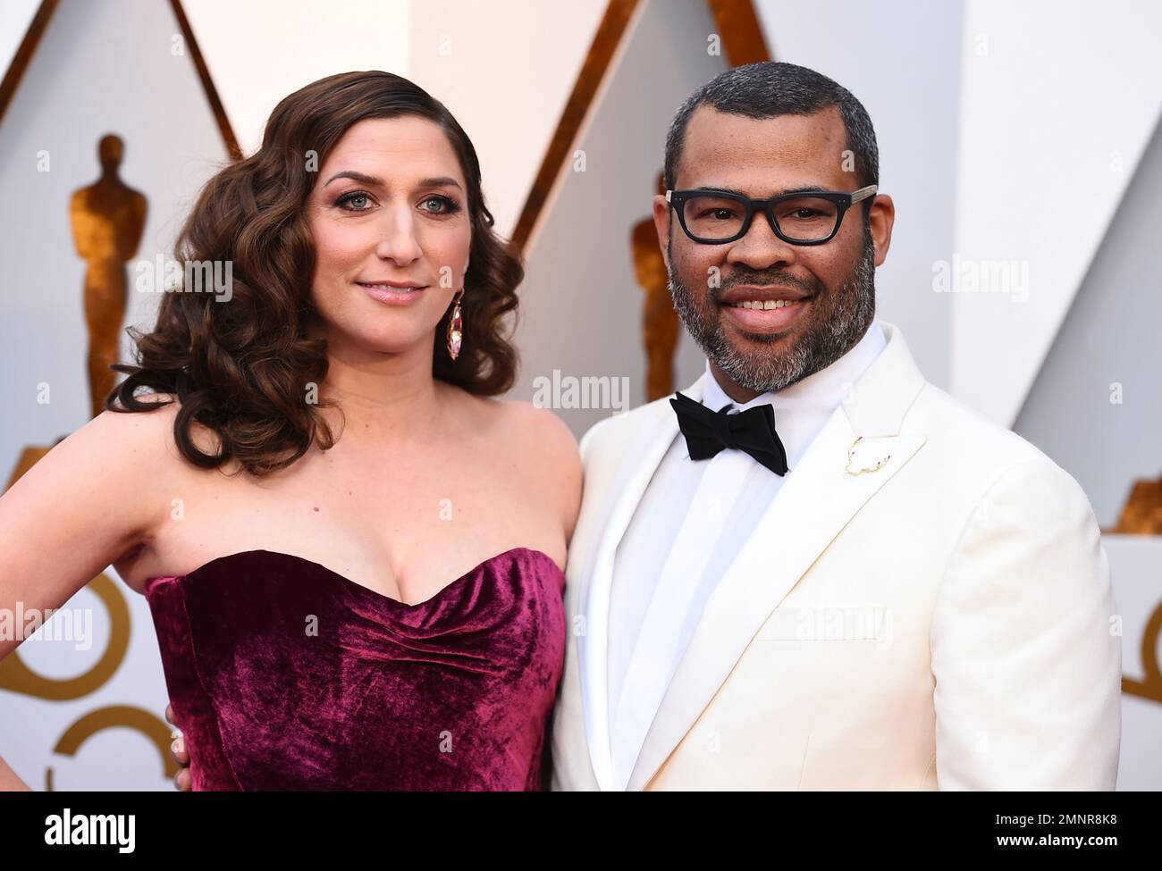 Chelsea Peretti, left, and Jordan Peele arrive at the Oscars on Sunday ...