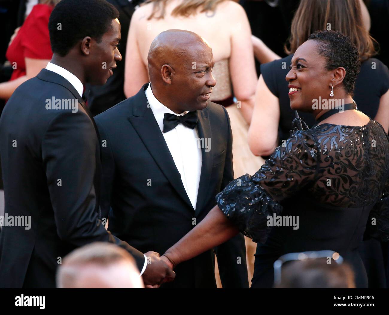 Damson Idris, left, and John Singleton arrive at the Oscars on Sunday ...