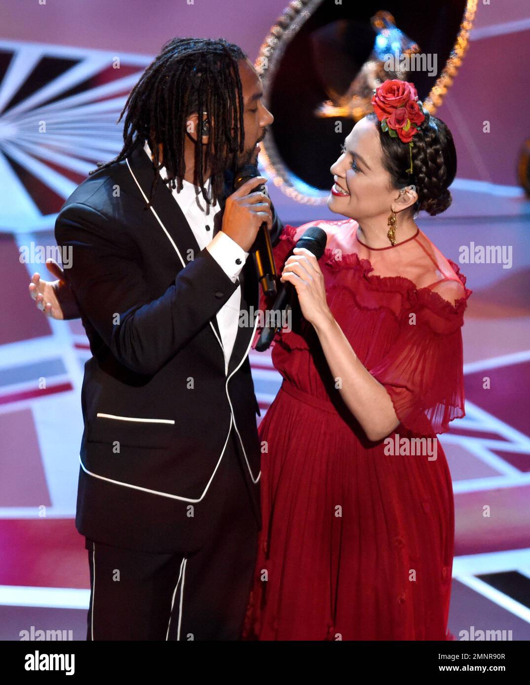 Miguel, left, and Natalia Lafourcade perform "Remember Me" from "Coco ...