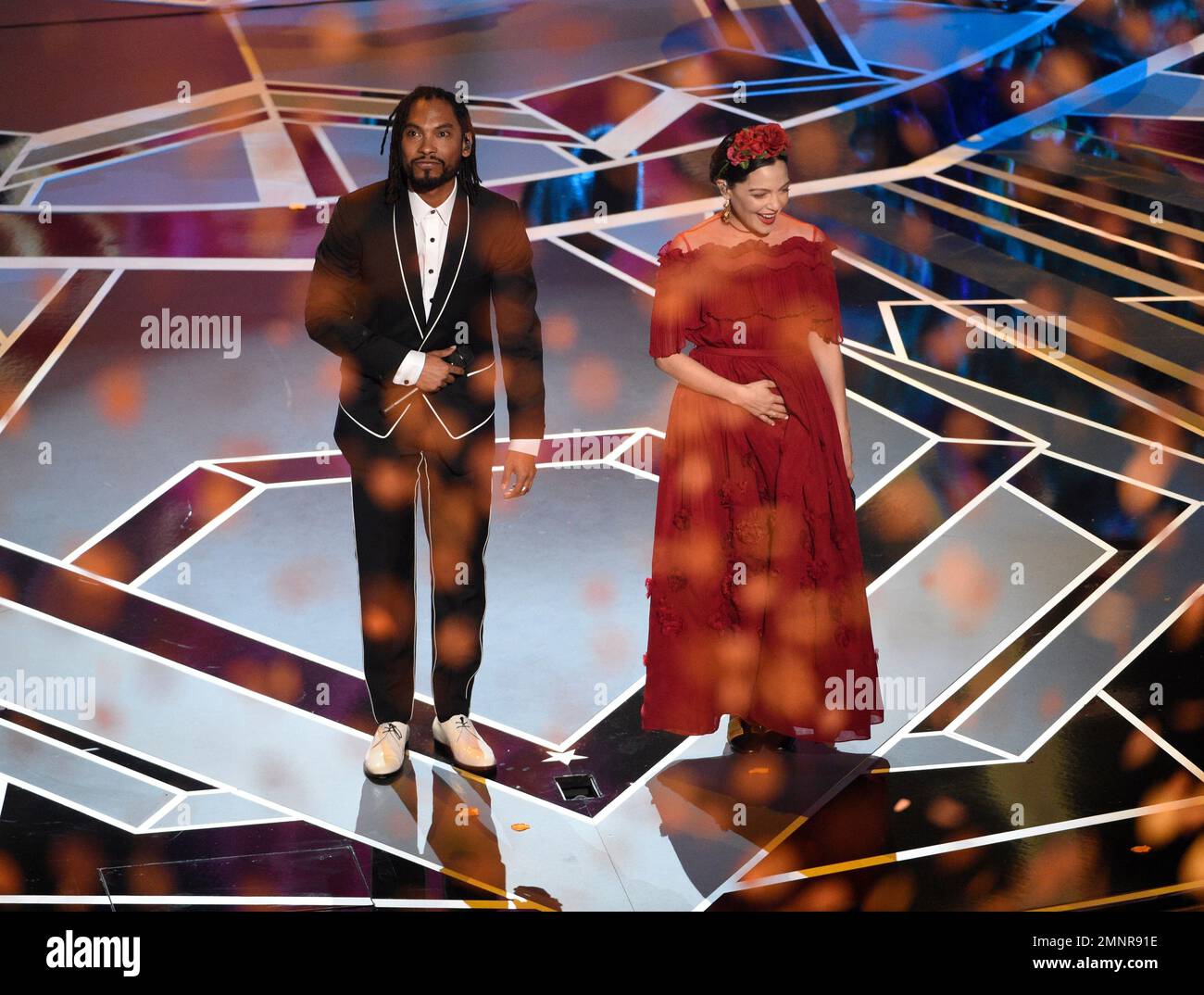Miguel, left, and Natalia Lafourcade perform "Remember Me" from "Coco ...