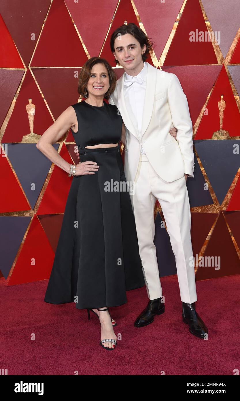 Nicole Flender, left, and Timothee Chalamet arrive at the Oscars on ...