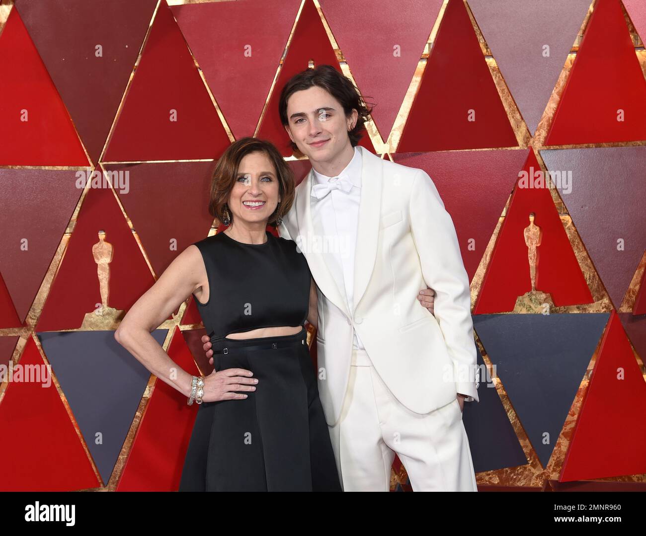 Nicole Flender, left, and Timothee Chalamet arrive at the Oscars on ...