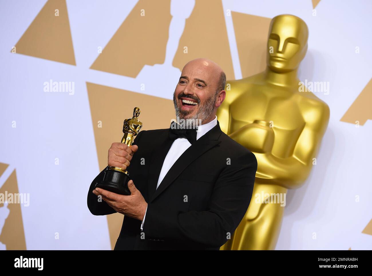 Mark Bridges, winner of the award for best costume design for "Phantom ...