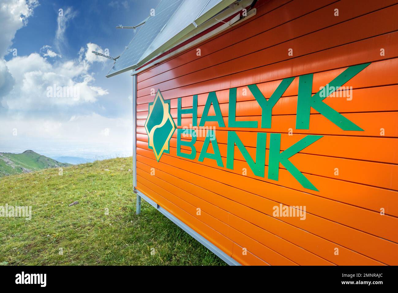 Halyk bank logo on self-contained rescue hut with solar panels for ...