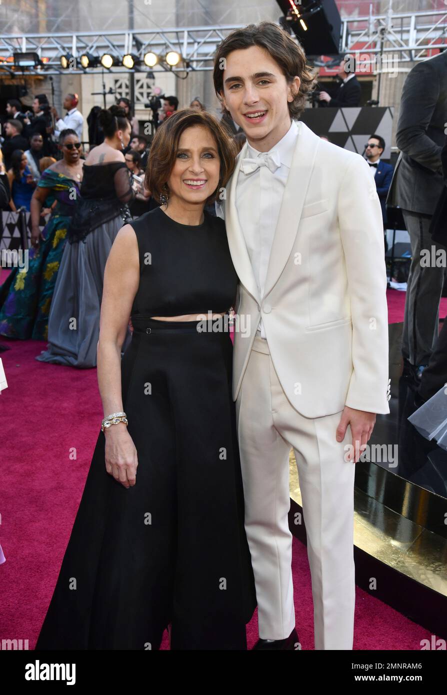 Nicole Flender, left, and Timothee Chalamet arrive at the Oscars on ...