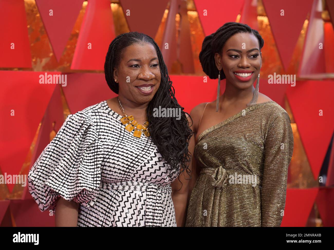 Tarana Burke, left, and Kaia Burke arrive at the Oscars on Sunday ...
