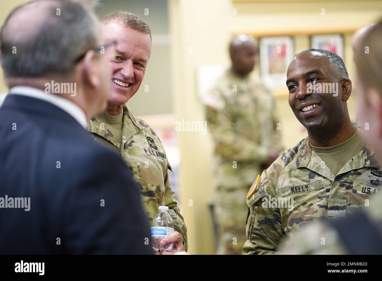 Maj. Gen. Bob D. Harter and Brig. Gen. Jason Kelly share a laugh with ...