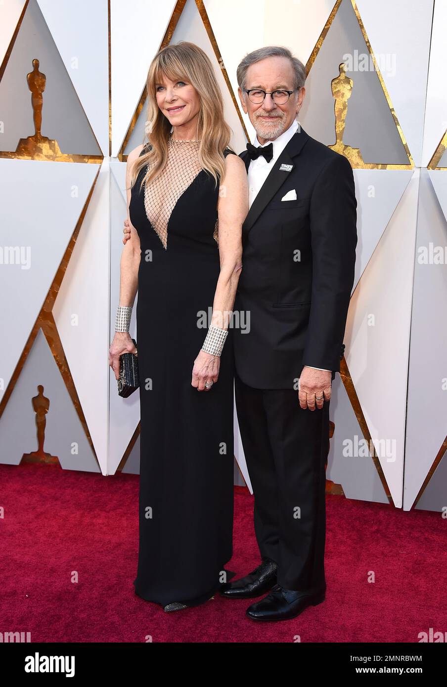 Kate Capshaw, left, and Steven Spielberg arrive at the Oscars on Sunday ...