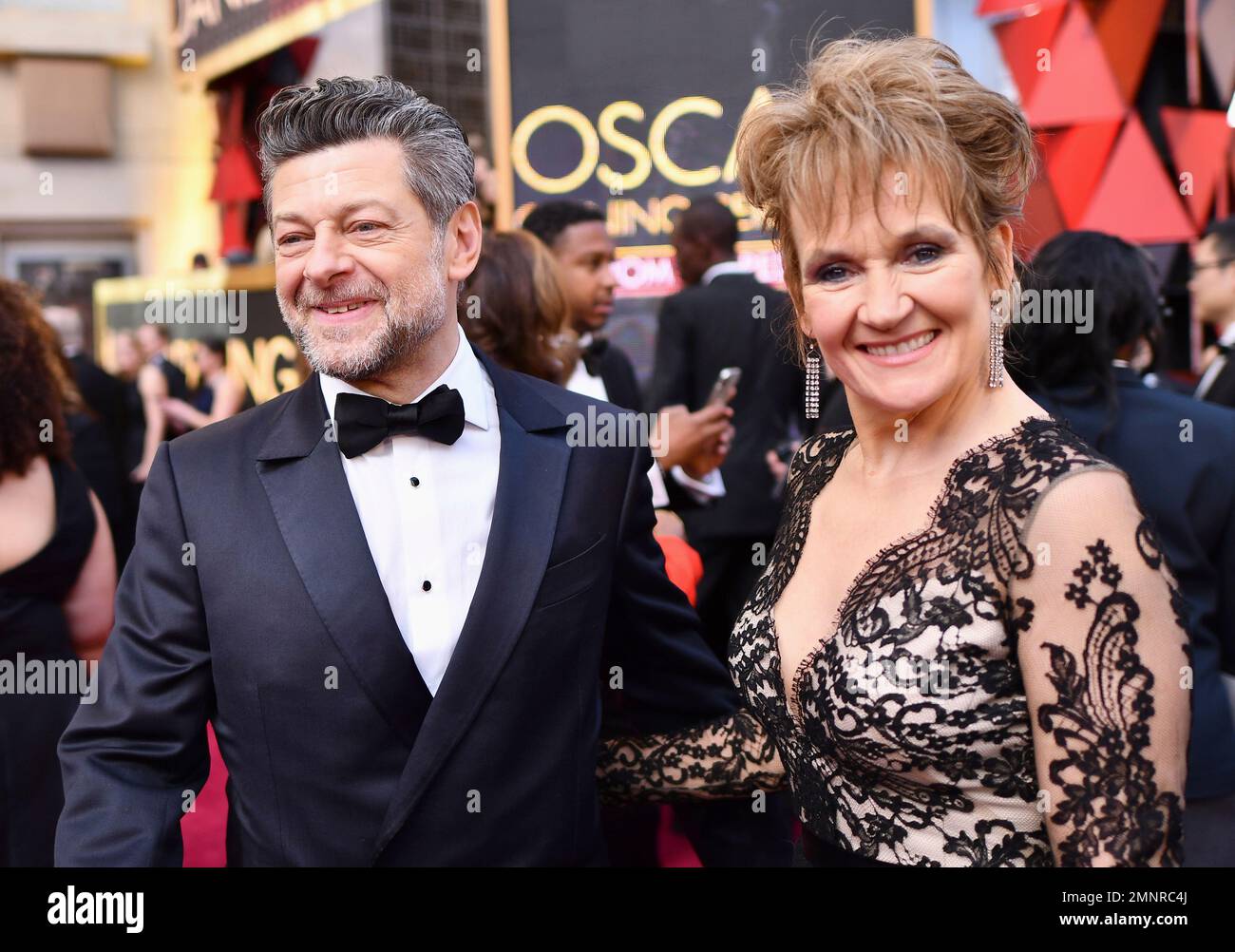 Andy Serkis, left, and Lorraine Ashbourne arrive at the Oscars on ...