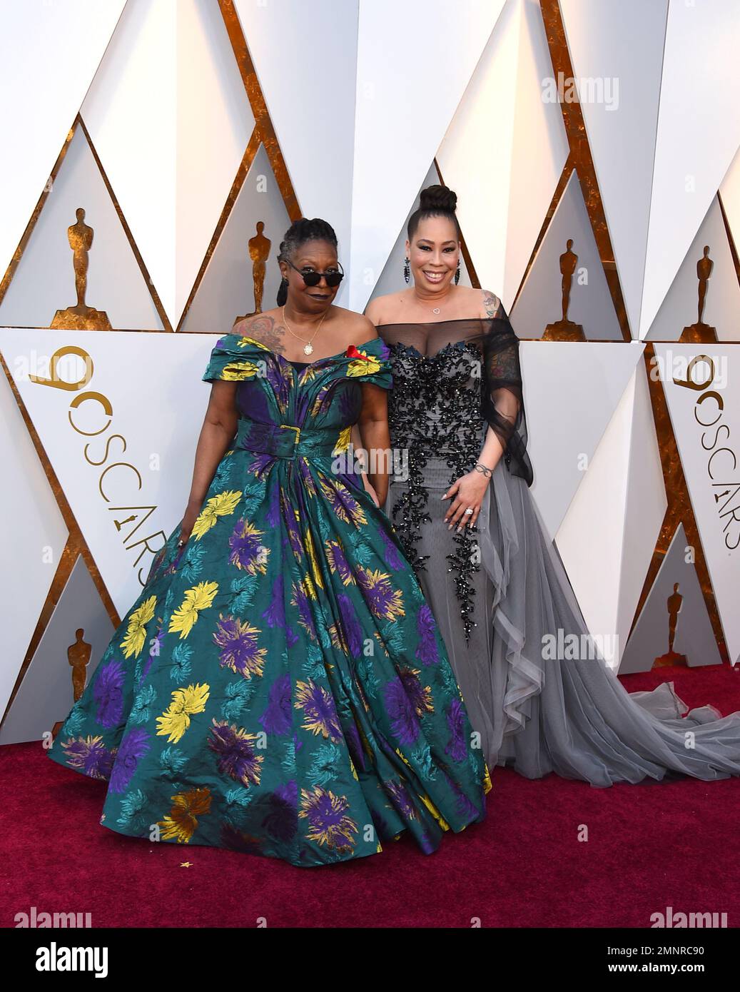 Whoopi Goldberg, left, and Alex Martin arrive at the Oscars on Sunday ...