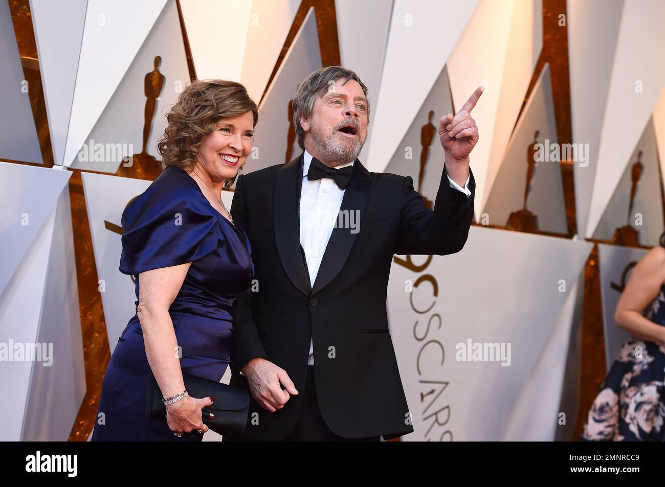 Marilou York, left, and Mark Hamill arrive at the Oscars on Sunday ...