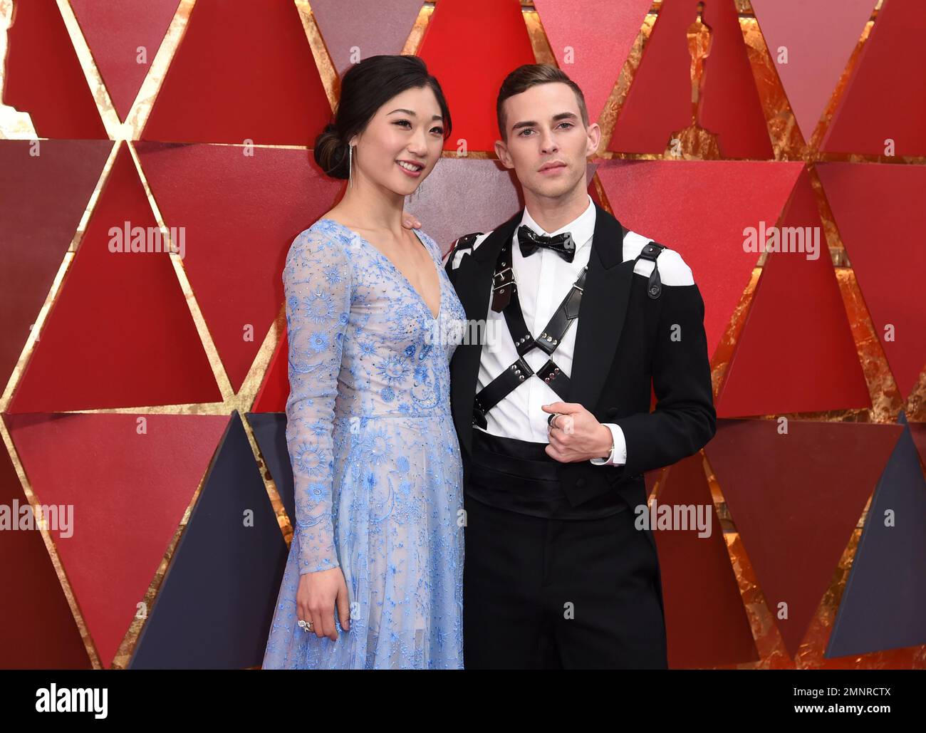 Mirai Nagasu, left, and Adam Rippon arrive at the Oscars on Sunday, March 4, 2018, at the Dolby ...