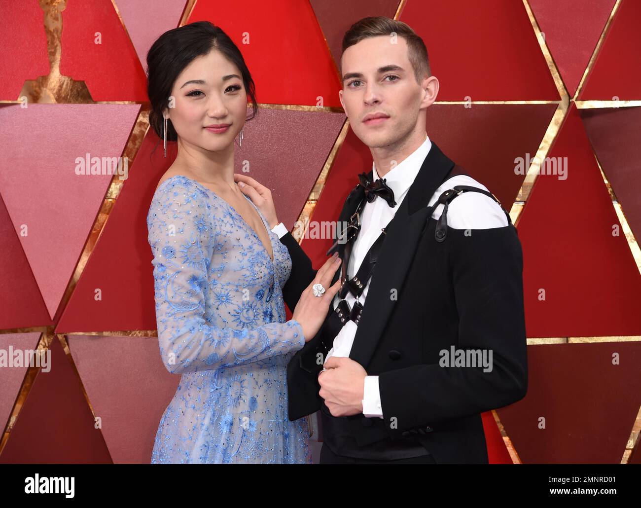 Mirai Nagasu, left, and Adam Rippon arrive at the Oscars on Sunday, March 4, 2018, at the Dolby ...
